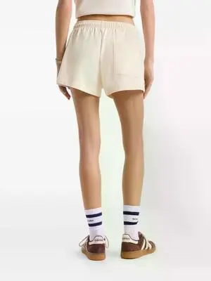 SPORTY & RICH Lion Health Disco Shorts