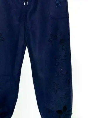 JUNTAE KIM Laser-cut Flower Track Pants