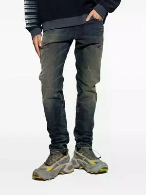 DIESEL® Faded Distressed Jeans