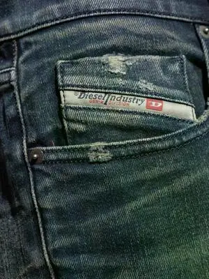 DIESEL® Faded Distressed Jeans