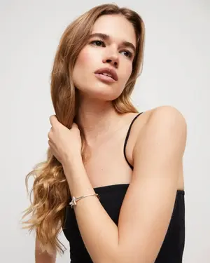 UNODE50 Sterling-plated Bangle Bracelet With White Topaz