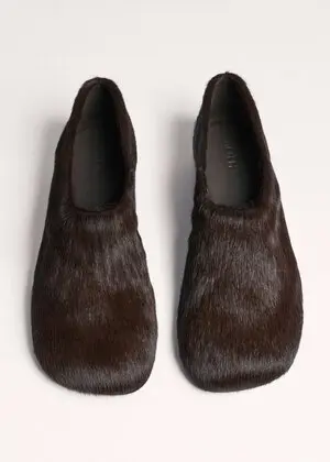 Asymmetric Slippers