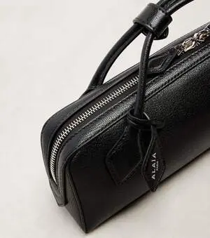 Alaïa Le Teckel Small Leather Clutch - Black
