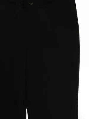 BLACK COMME DES GARÇONS Wool Trousers