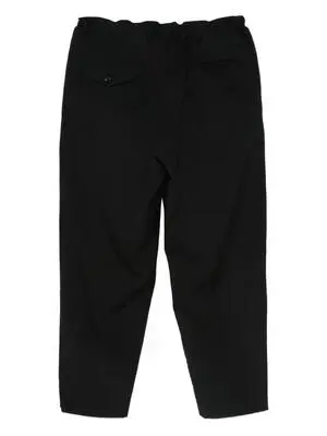 BLACK COMME DES GARÇONS Elasticated-waist Wool Trousers