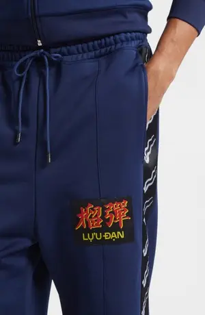 LU'U DAN Stacked Track Pants