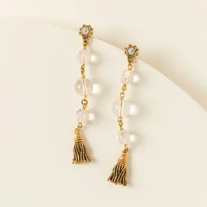 UNCOMMON GOODS Waldorf Astoria Chandelier Earrings - Gold/clear