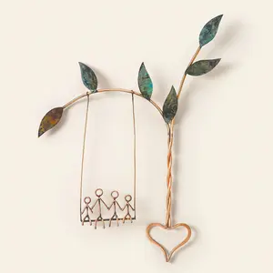 UNCOMMON GOODS Rooted In Love Swing Sculpture Haw Creek Forge - Family Of 4