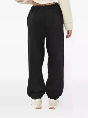 Khaite Button-detailed Pleated Trousers