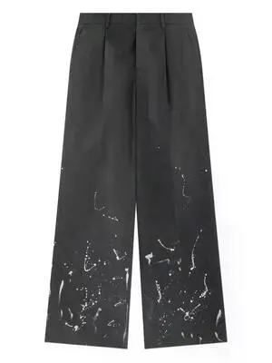 We11Done Pleated Paint-splatter Trousers