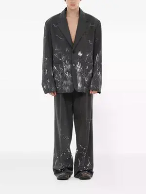 We11Done Pleated Paint-splatter Trousers