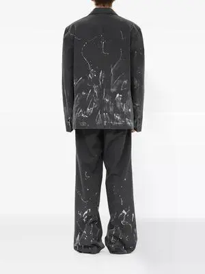 We11Done Pleated Paint-splatter Trousers