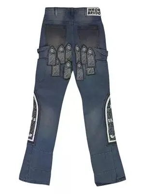 WHO DECIDES WAR BY EV BRAVADO Patched Jeans