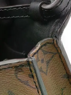 LOUIS VUITTON 2017 Monogram Reverse Column Clutch