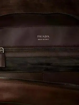 Prada Buckled Leather Backpack - Brown