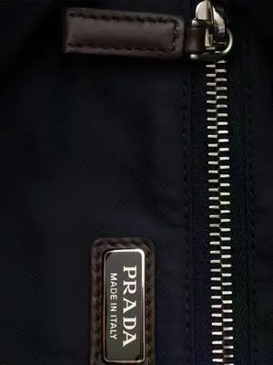 Prada Leather-trimmed Logo Plaque Wash Bag