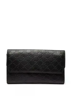 Gucci Embossed Clutches