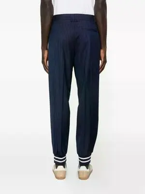 Moschino Pinstriped Trousers With Ribbed Cuffs