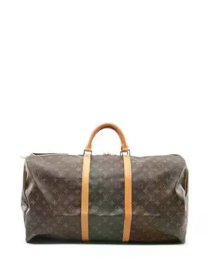 Louis Vuitton Gold Tone Travel Bags