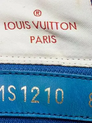 LOUIS VUITTON Rivoli Logo-print Sneakers