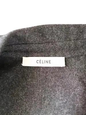 Celine Asymmetric Button-detailed Coat
