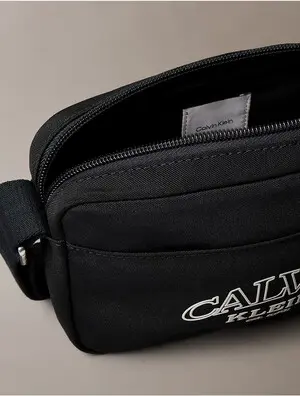 Calvin Klein Curved Logo Graphic Camera Bag