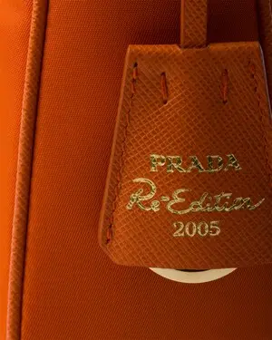 Prada Re-edition 2005 Re-nylon And Saffiano Mini Bag - Orange