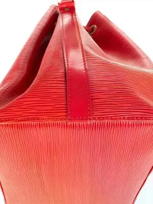 LOUIS VUITTON 1990s Monogram Embossed Leather Bucket Bag