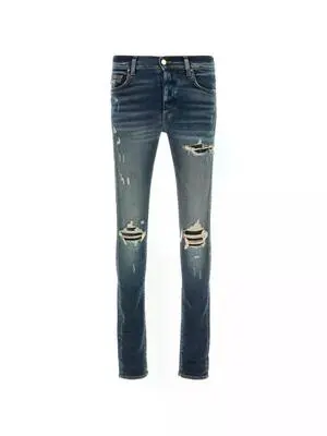 Amiri Distressed Stretch Denim Jeans - Blue