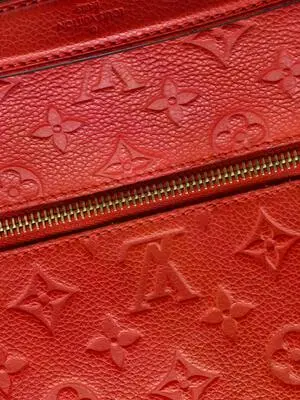 LOUIS VUITTON Pochette Metis Monogram Empreinte Leather Crossbody Bag - Red