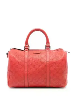 Gucci Embossed Travel Bags