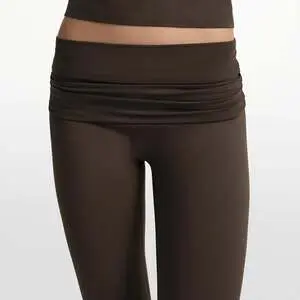 SKIMS Nike Matte Foldover Slim Flare Legging - Dark Sepia