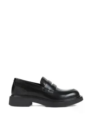 Gucci Monogram Debossed Loafers - Black