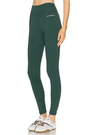 SPORTY & RICH Serif Logo Legging In Dark Green
