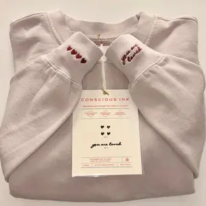 CONSCIOUS INK You Are Loved" Embroidered Crewneck Sweatshirt With Manifestation Kit - Faded Bone