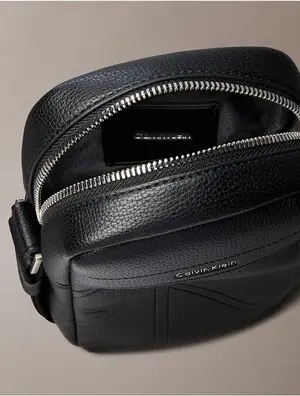 Calvin Klein Allover Embossed Emblem Logo Reporter Bag - Black