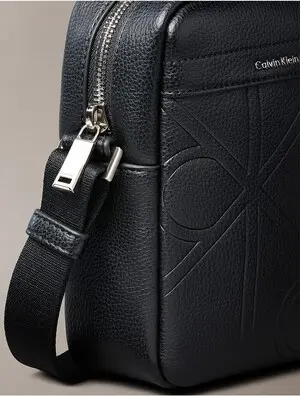 Calvin Klein Allover Embossed Emblem Logo Reporter Bag - Black