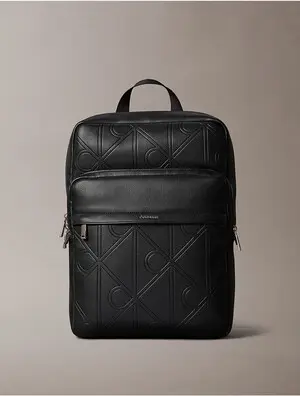 Calvin Klein Allover Embossed Emblem Logo Round Backpack - Black