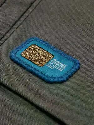 AAPE BY *A BATHING APE Logo-appliqué Trousers