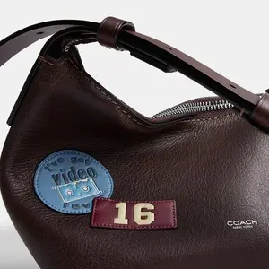COACH Mott Sling Bag 22 In Loved Leather With Stickers