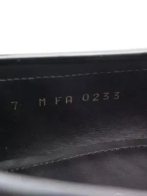 LOUIS VUITTON Studded Leather Loafers