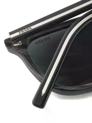 Prada Sunglasses With The Iconic Metal Plaque