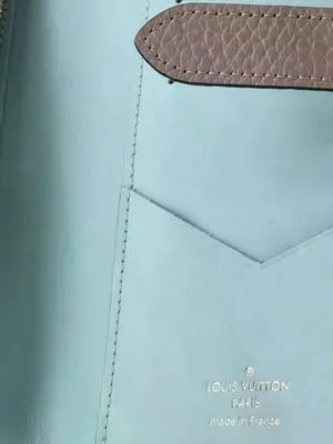 LOUIS VUITTON Capucines Vertical Wallet Leather Small Wallets