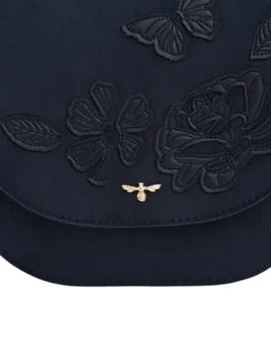 FABLE ENGLAND Beth Floral Applique Faux Suede Saddle Purse