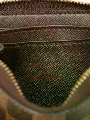 LOUIS VUITTON 2009 Damier Ebene Zippy Purse Coin Pouch