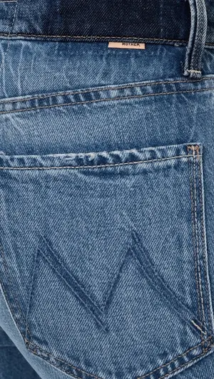 MOTHER Bookie Slit Twist Heel Fray Jeans