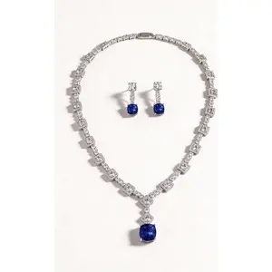 MODENAIRE Crystal Pendant Necklace And Matching Drop Earring Set - Blue