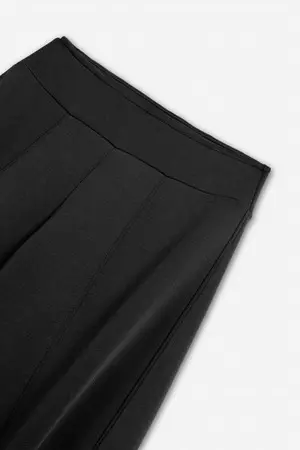 NOCTURNE Asymmetric Cut Trousers