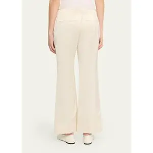 TOTEME Kick Flare Raw-edge Trousers