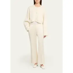 TOTEME Kick Flare Raw-edge Trousers